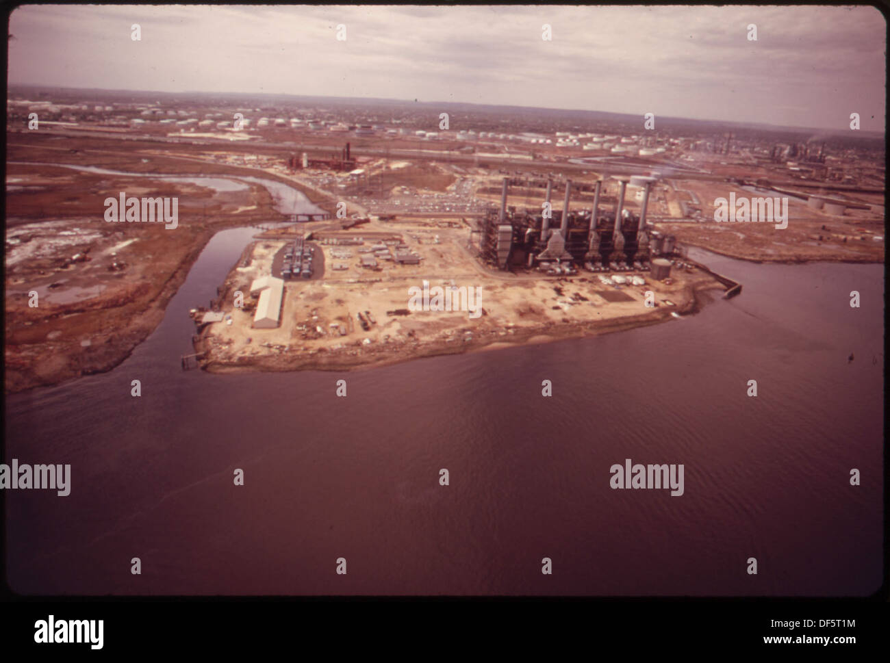 INDUSTRIAL PLANT OWNED BY AGRICO, OVERLOOKING THE ARTHUR KILL, WHICH ...