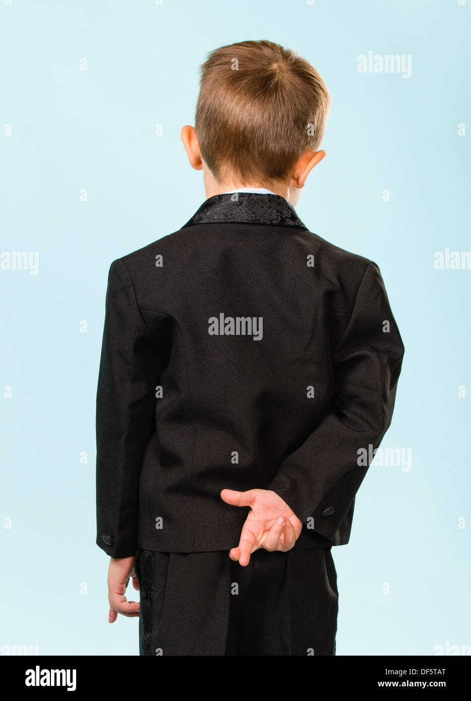 Fingers Crossed Behind Back Child