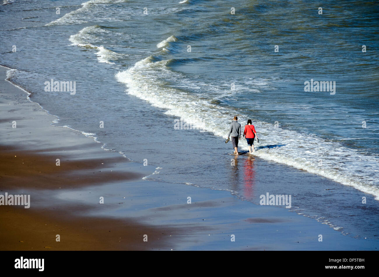 A stroll on the beach Stock Photo - Alamy
