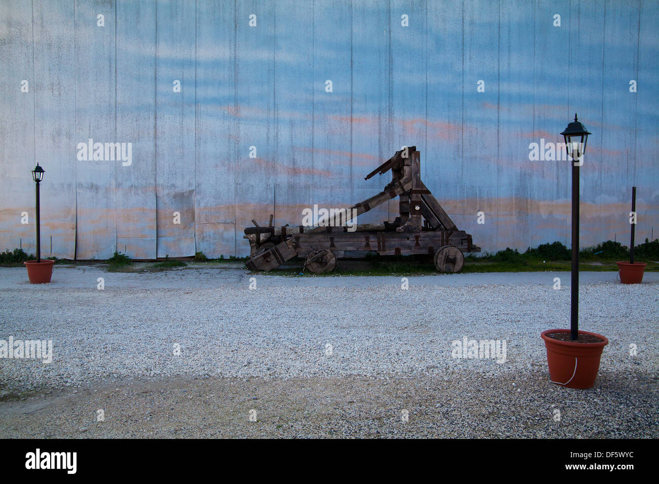 A catapult stands under a painted sky at Cinecitta film studios in Rome ...