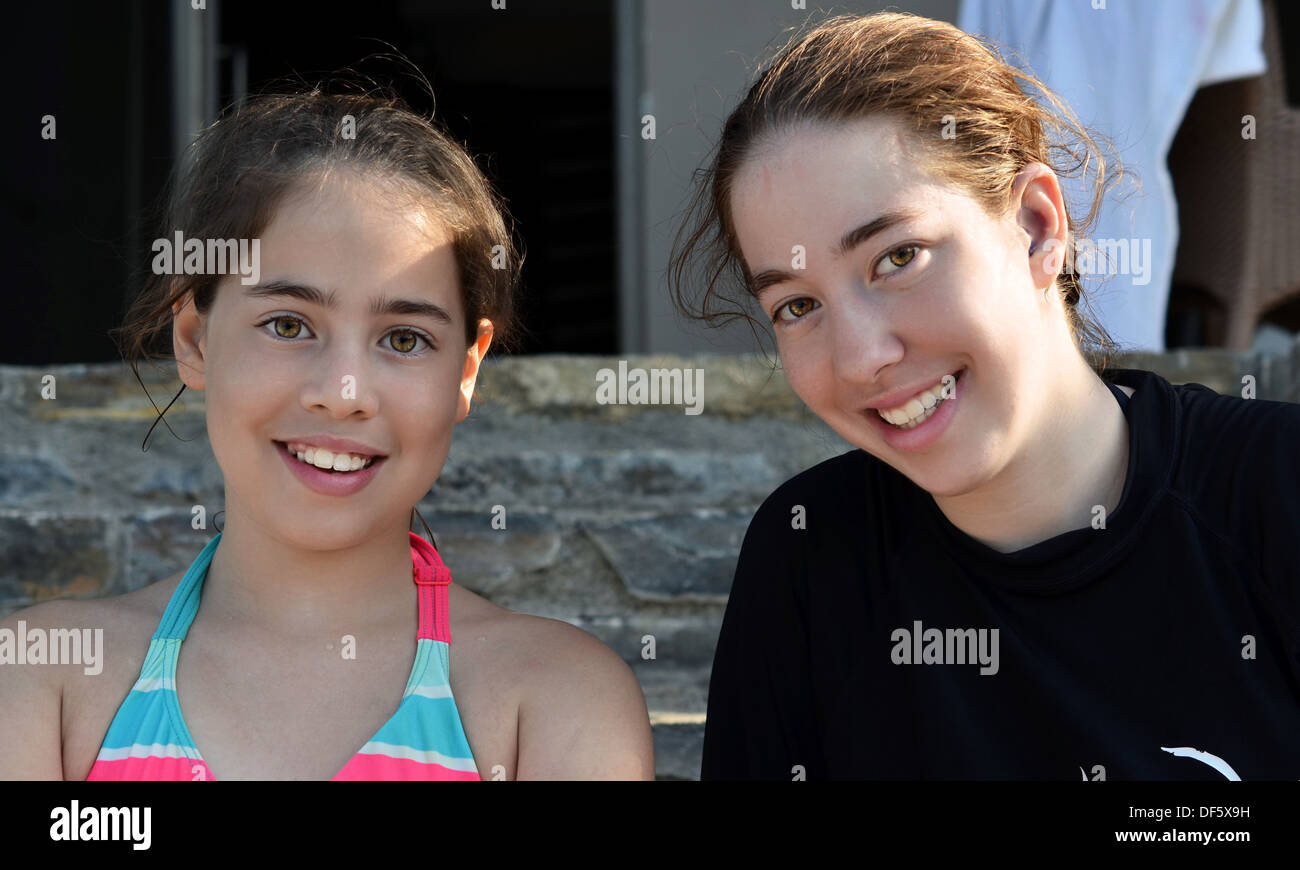 Sisters in swimming pool High Resolution Stock Photography and Images ...