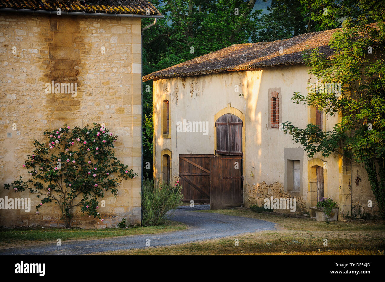 Old French barn at sunrise Stock Photo - Alamy