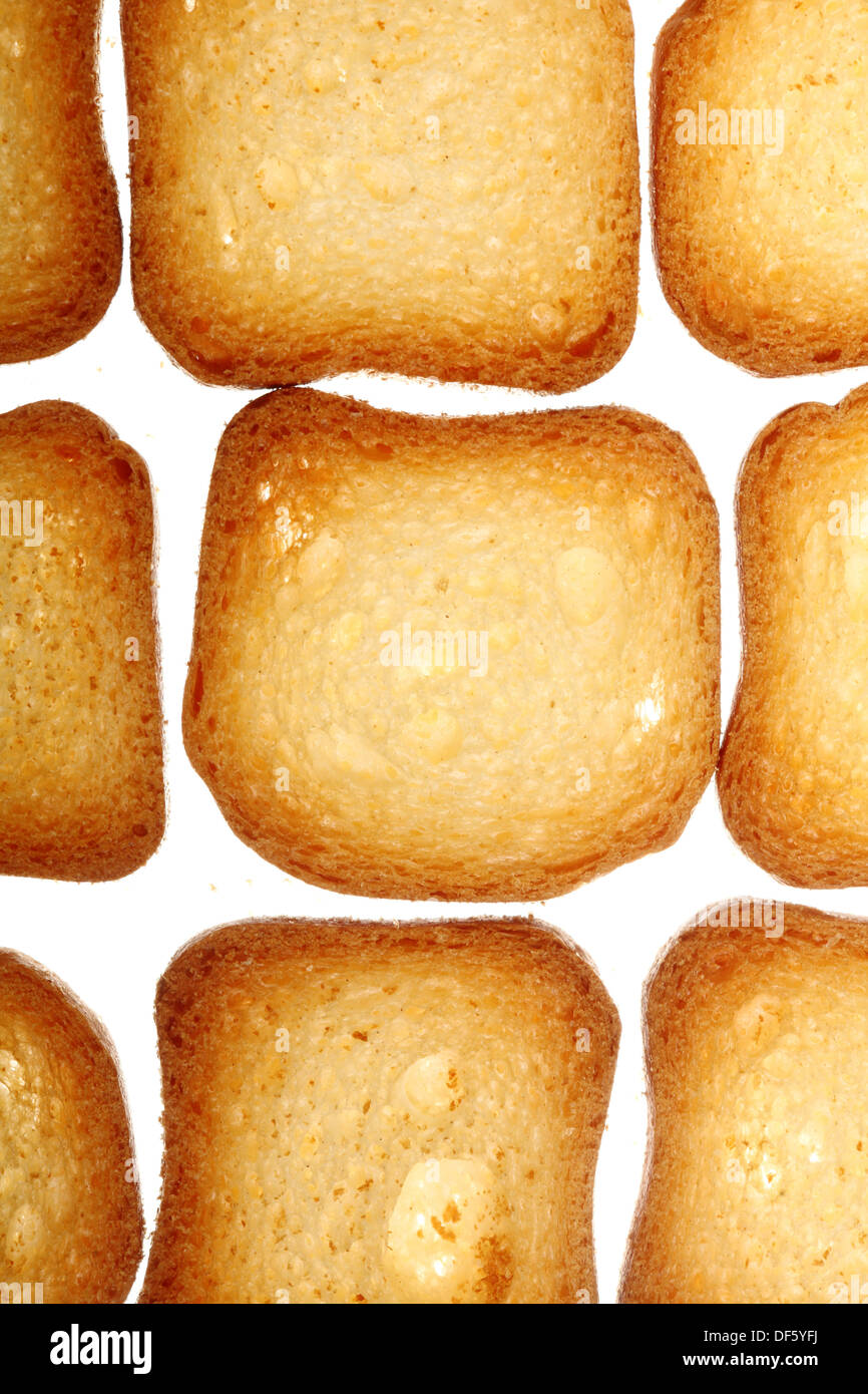 Many small dried rusks bread loaf toast biscuits as texture background ...