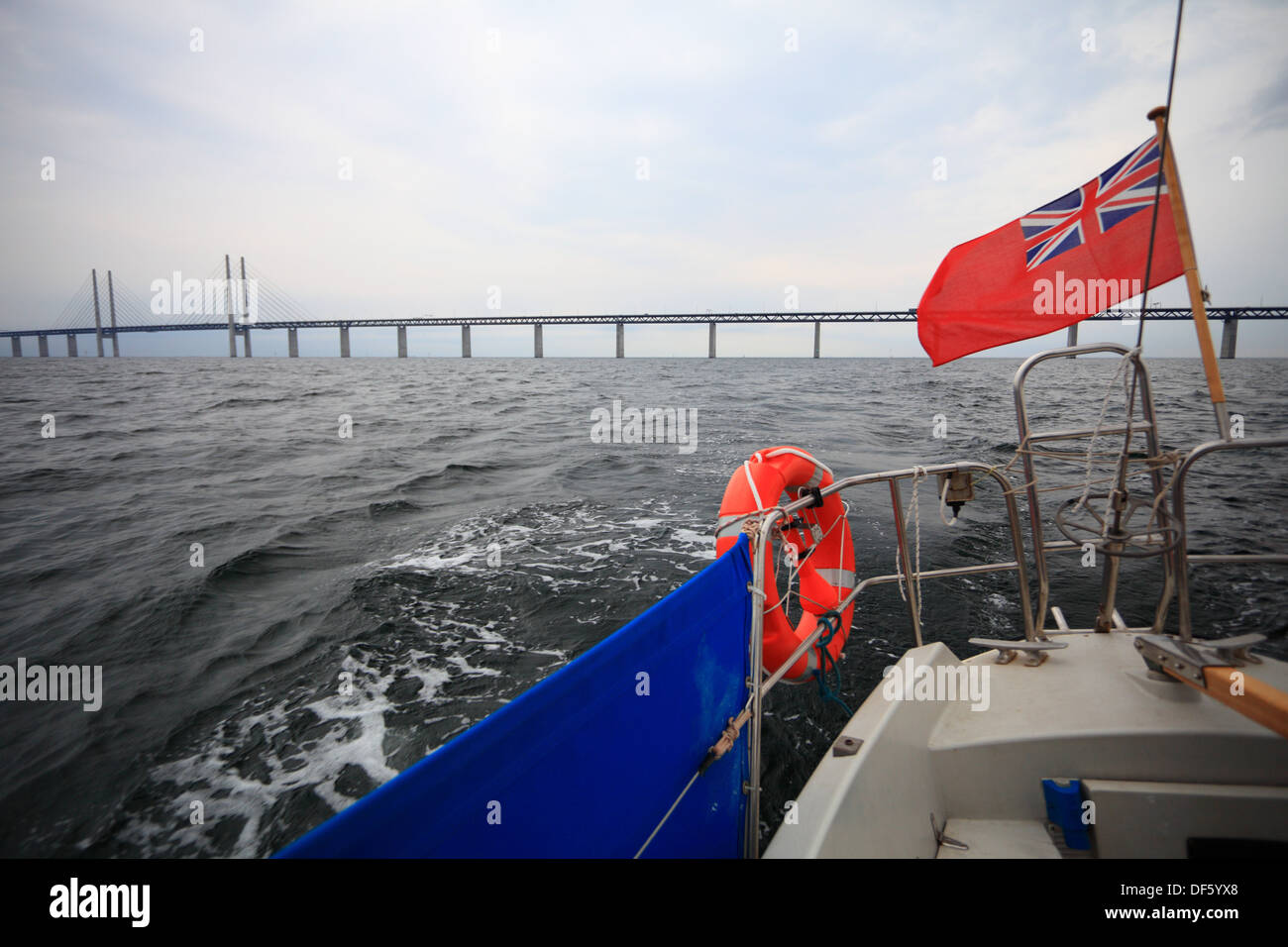 The UK red ensign the british maritime flag flown from a yacht sail ...