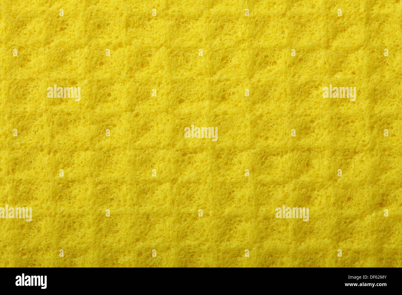 Yellow kitchen sponge rubber foam as background texture Stock Photo - Alamy