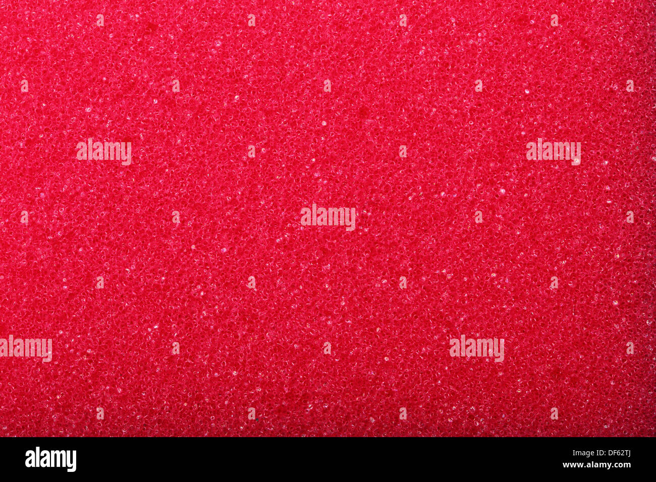 Red texture cellulose foam sponge - background Stock Photo - Alamy