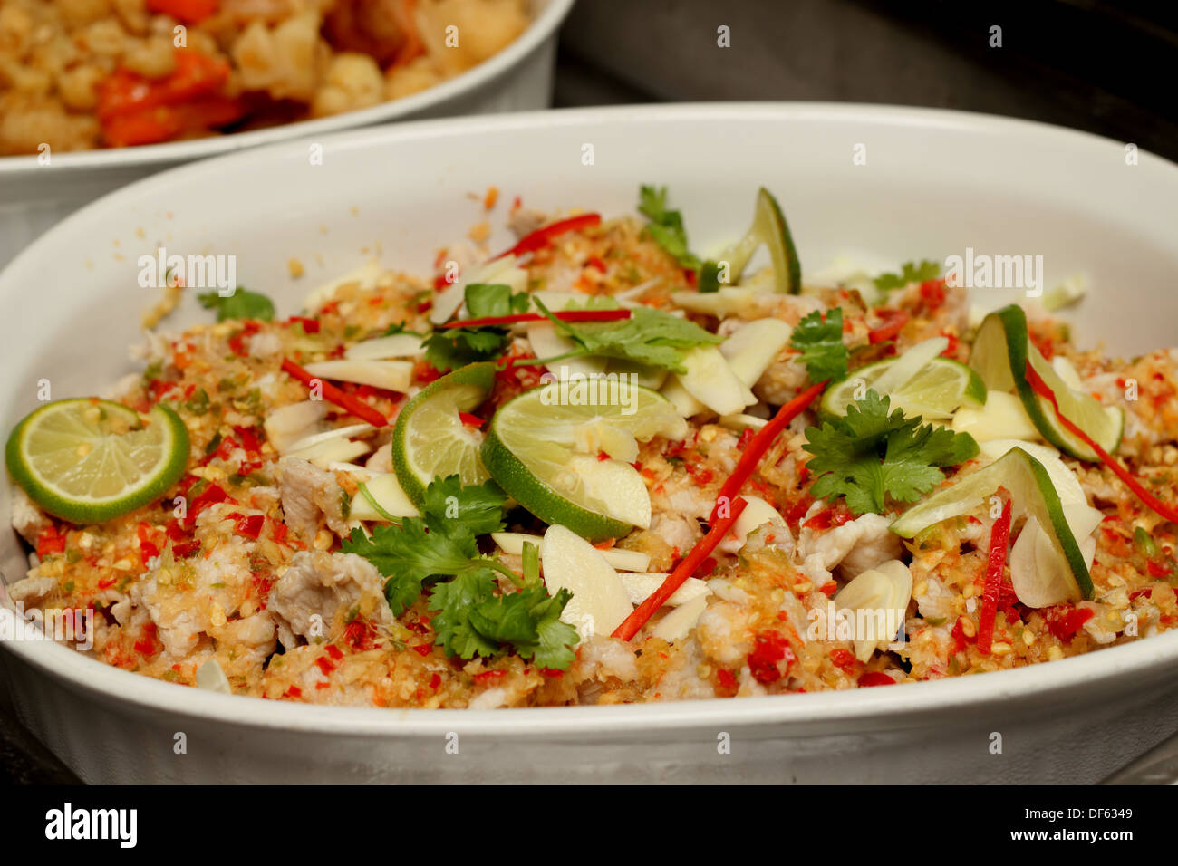 Steamed snapper fish with lemon at seafood restaurant Stock Photo - Alamy