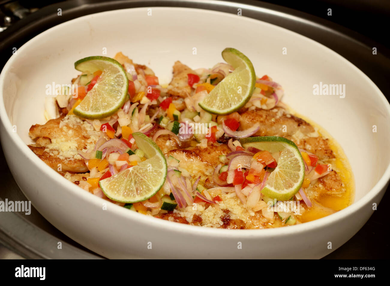 Steamed snapper fish with lemon at seafood restaurant Stock Photo - Alamy