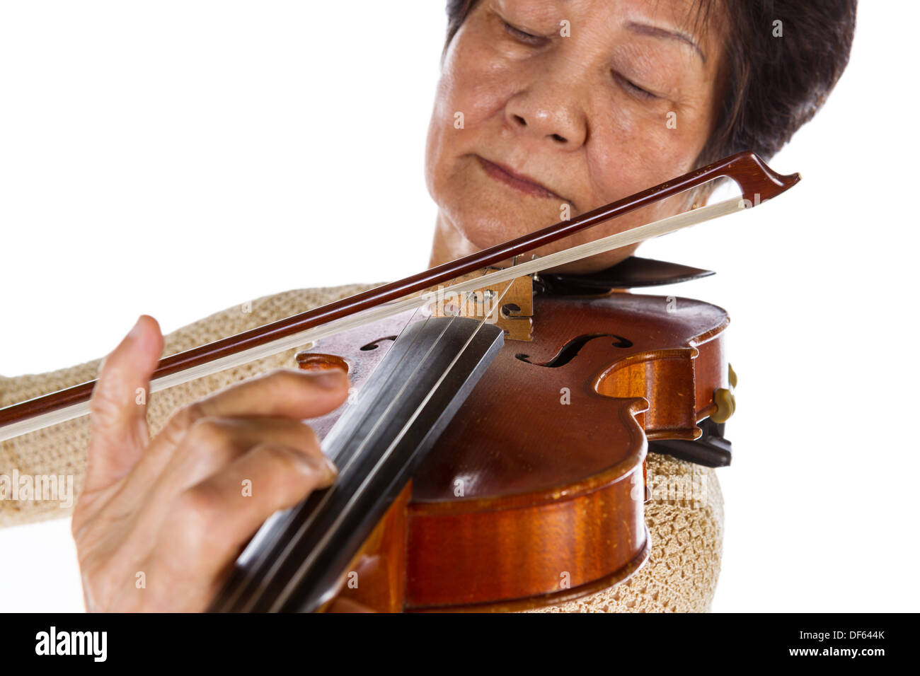 Closeup horizontal photo of violin string and bow touching with senior ...