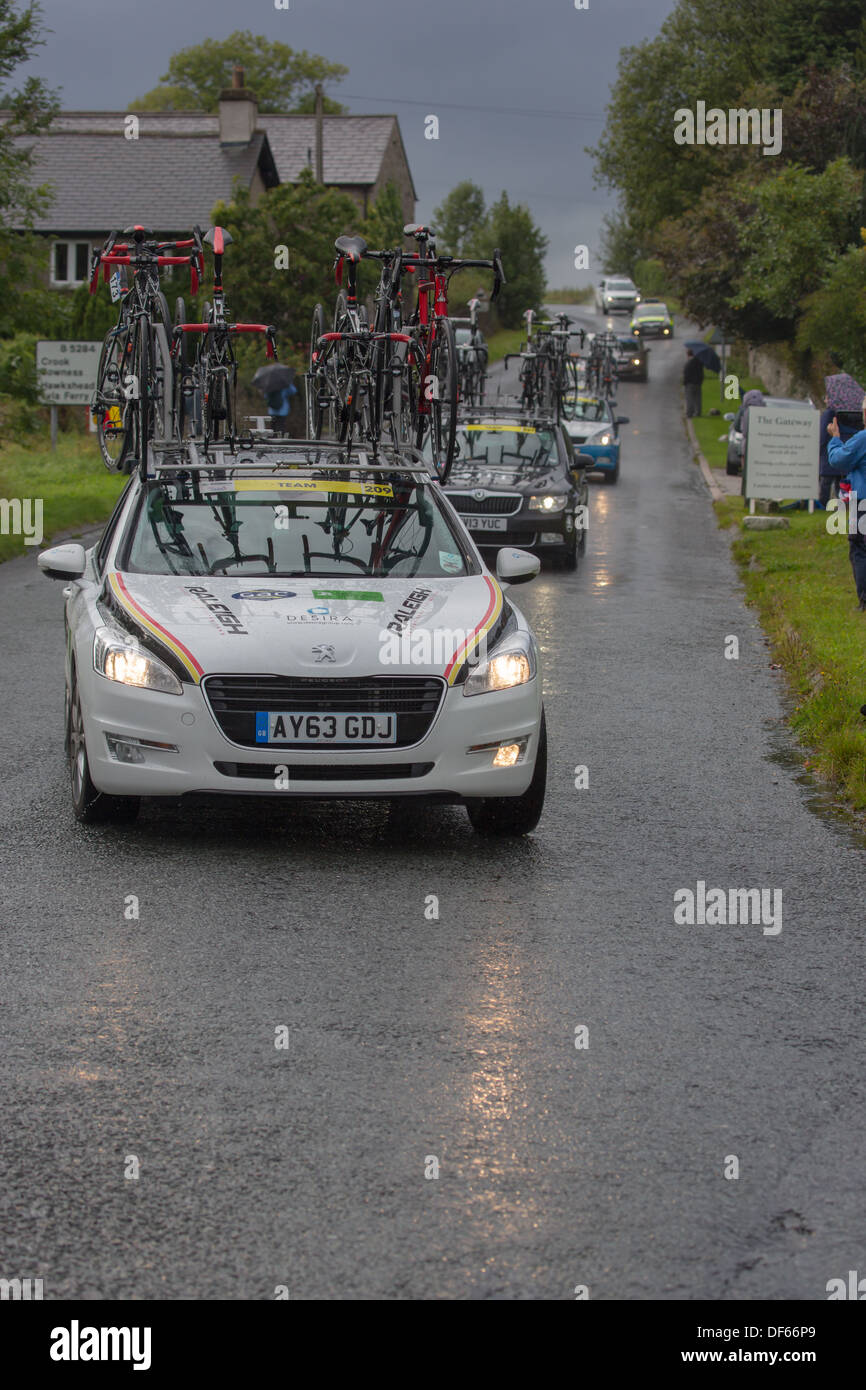 Support vehicles following the the Tour of Britain Road Cycling Race as ...