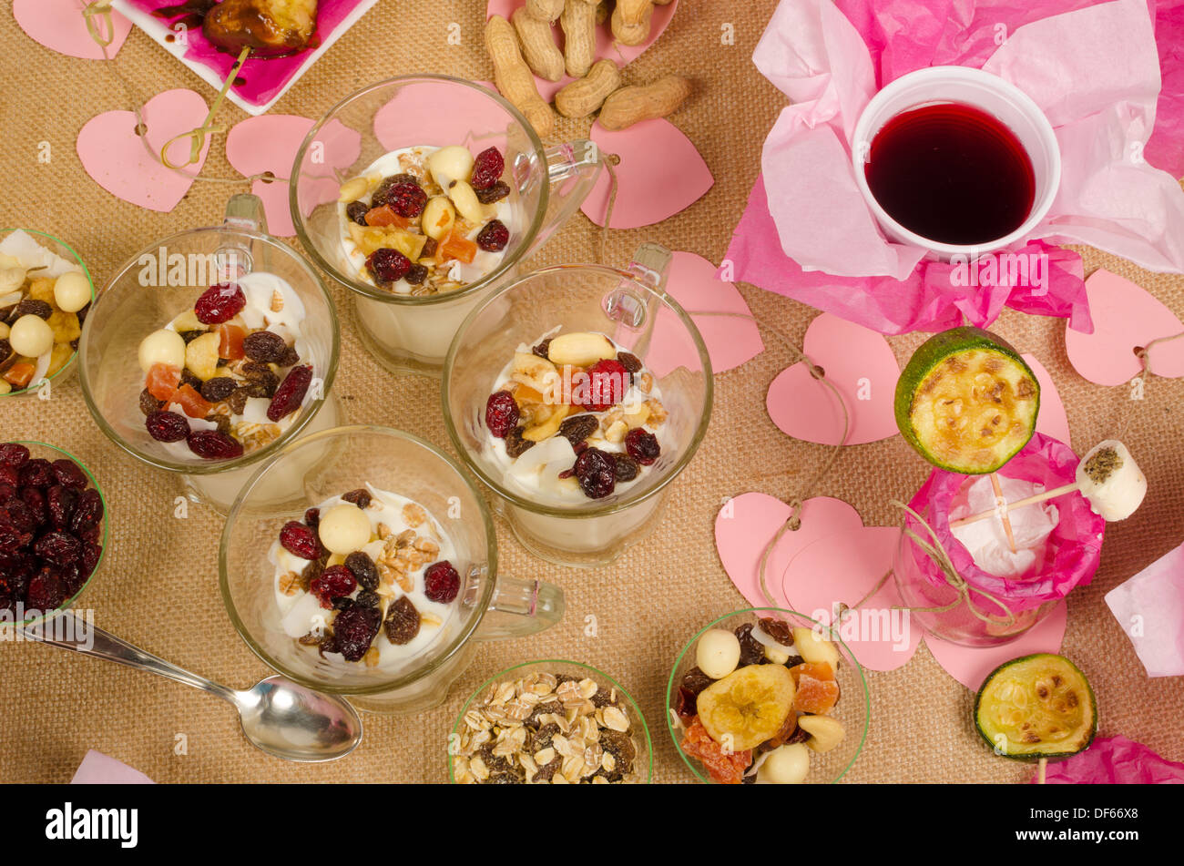 Healthy snacks on a decorated party table Stock Photo - Alamy