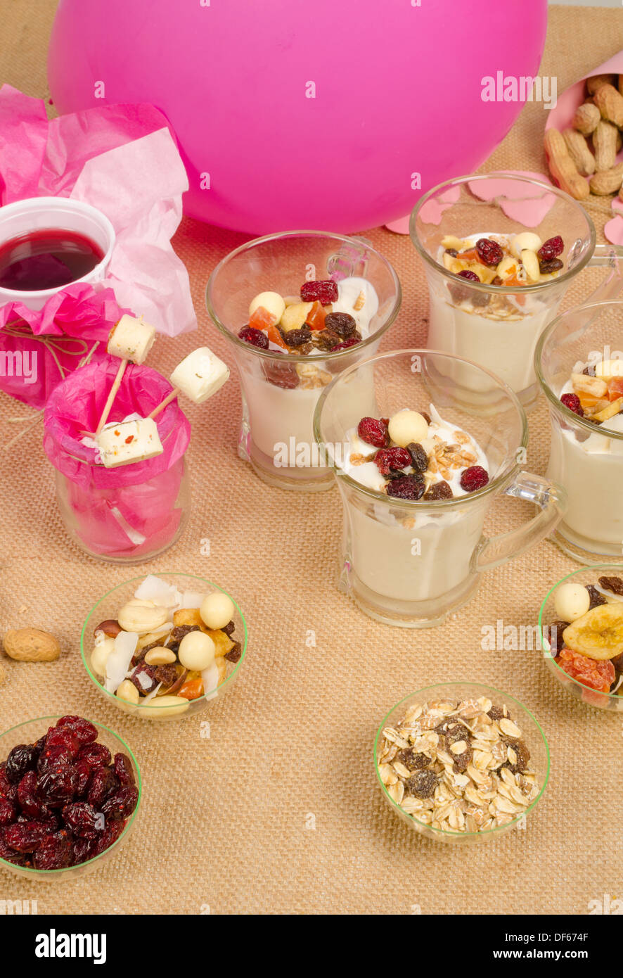Party table with an assortment of healthy snacks Stock Photo - Alamy