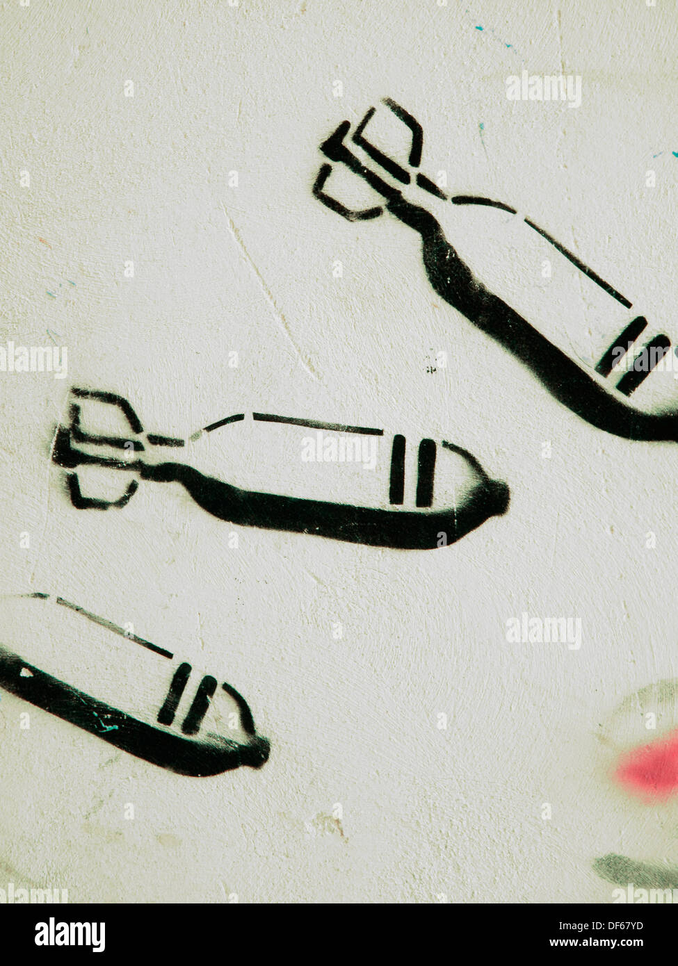 Street art graffiti of falling bombs Stock Photo - Alamy