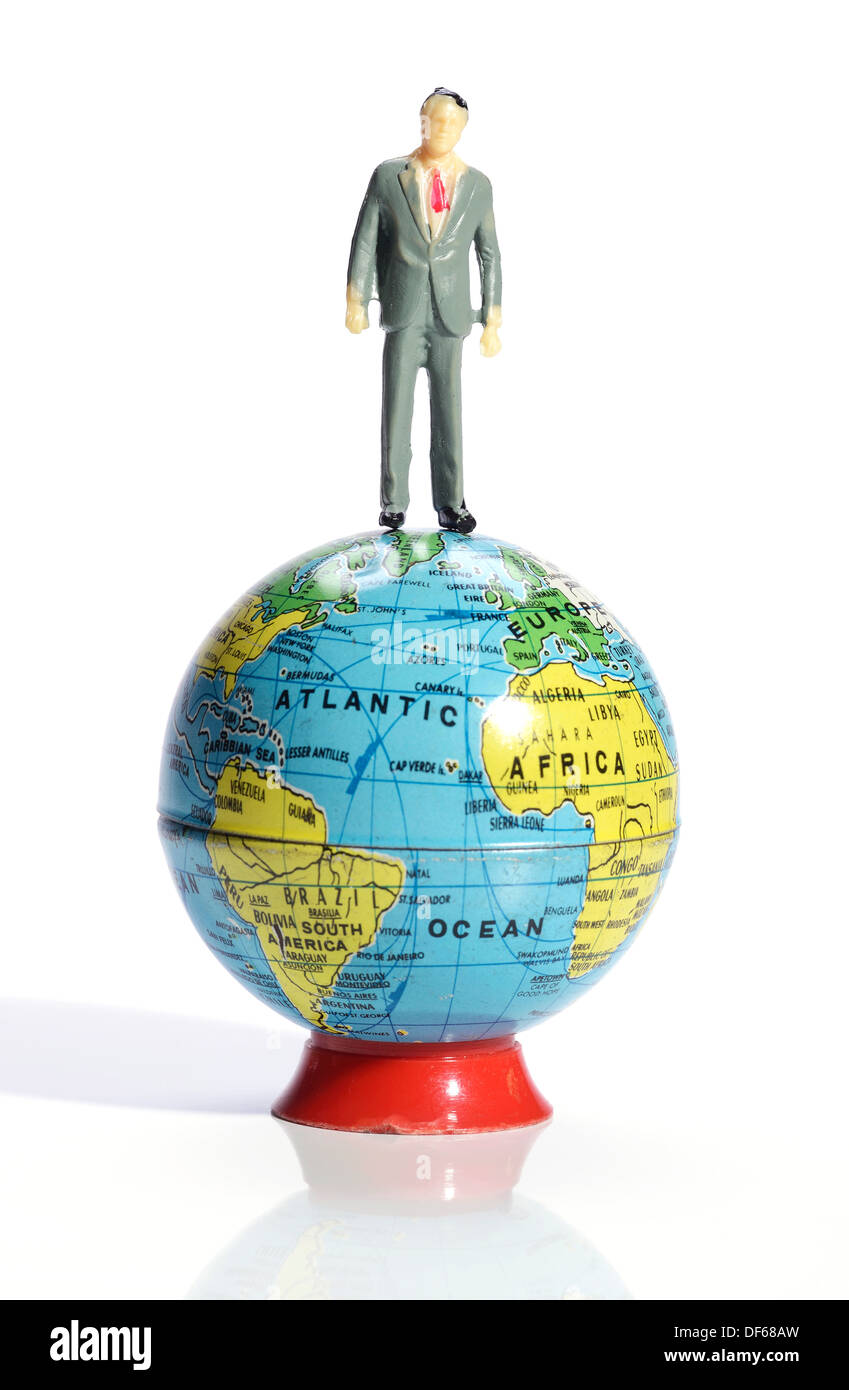 Business standing on globe hi-res stock photography and images - Alamy