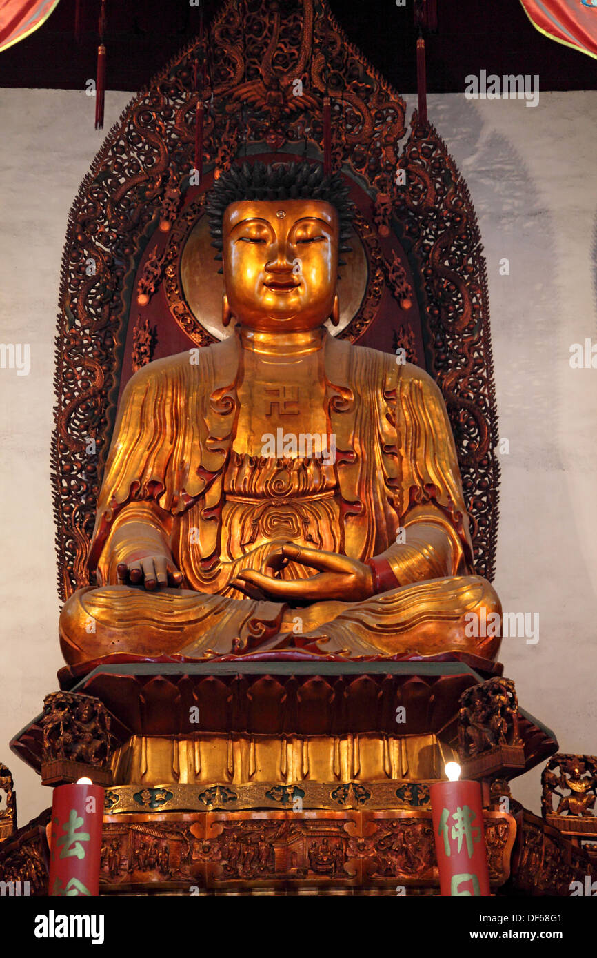 Golden buddha statue in a temple in Shanghai, China Stock Photo - Alamy