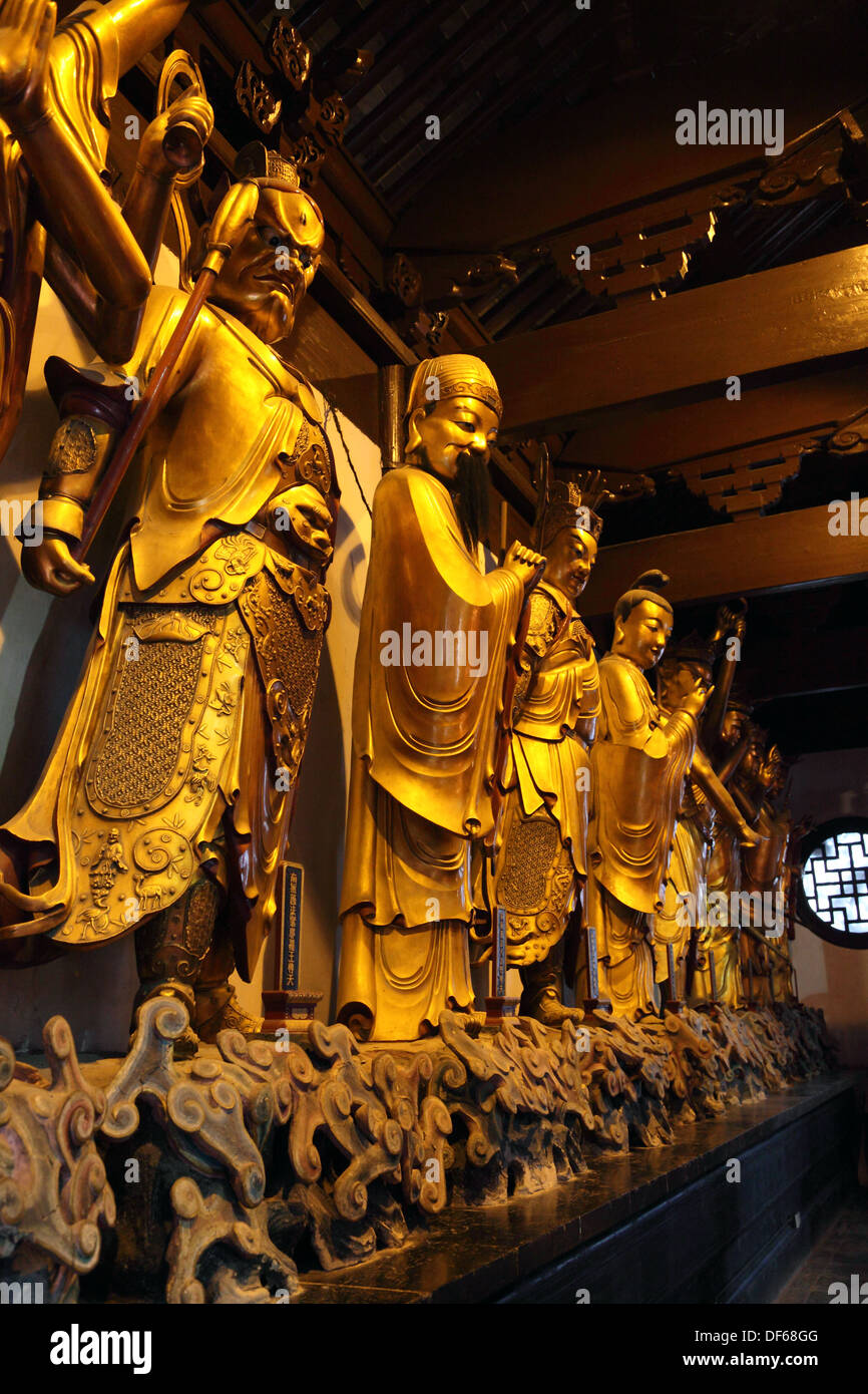 Golden statue in a buddhist temple in Shanghai, China Stock Photo - Alamy