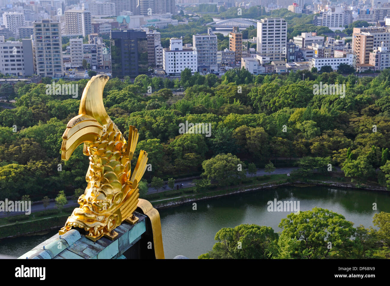 View from the top floor of Osaka castle with the park and business city ...