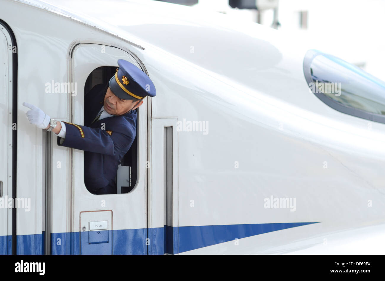 A guard on a bullet train in Japan Stock Photo - Alamy