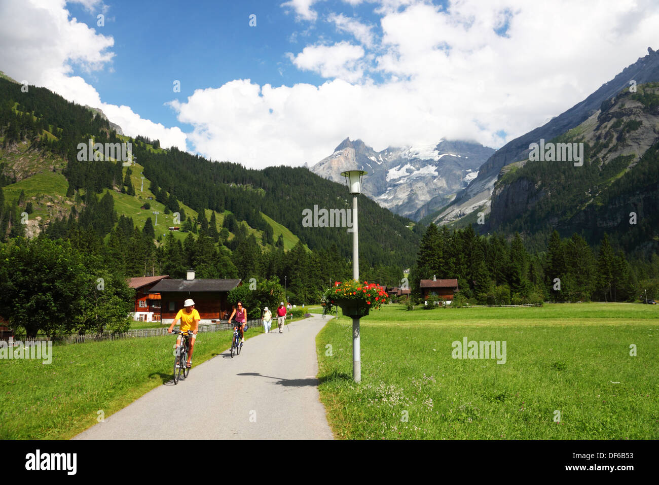 Cycling through a village hi-res stock photography and images - Alamy