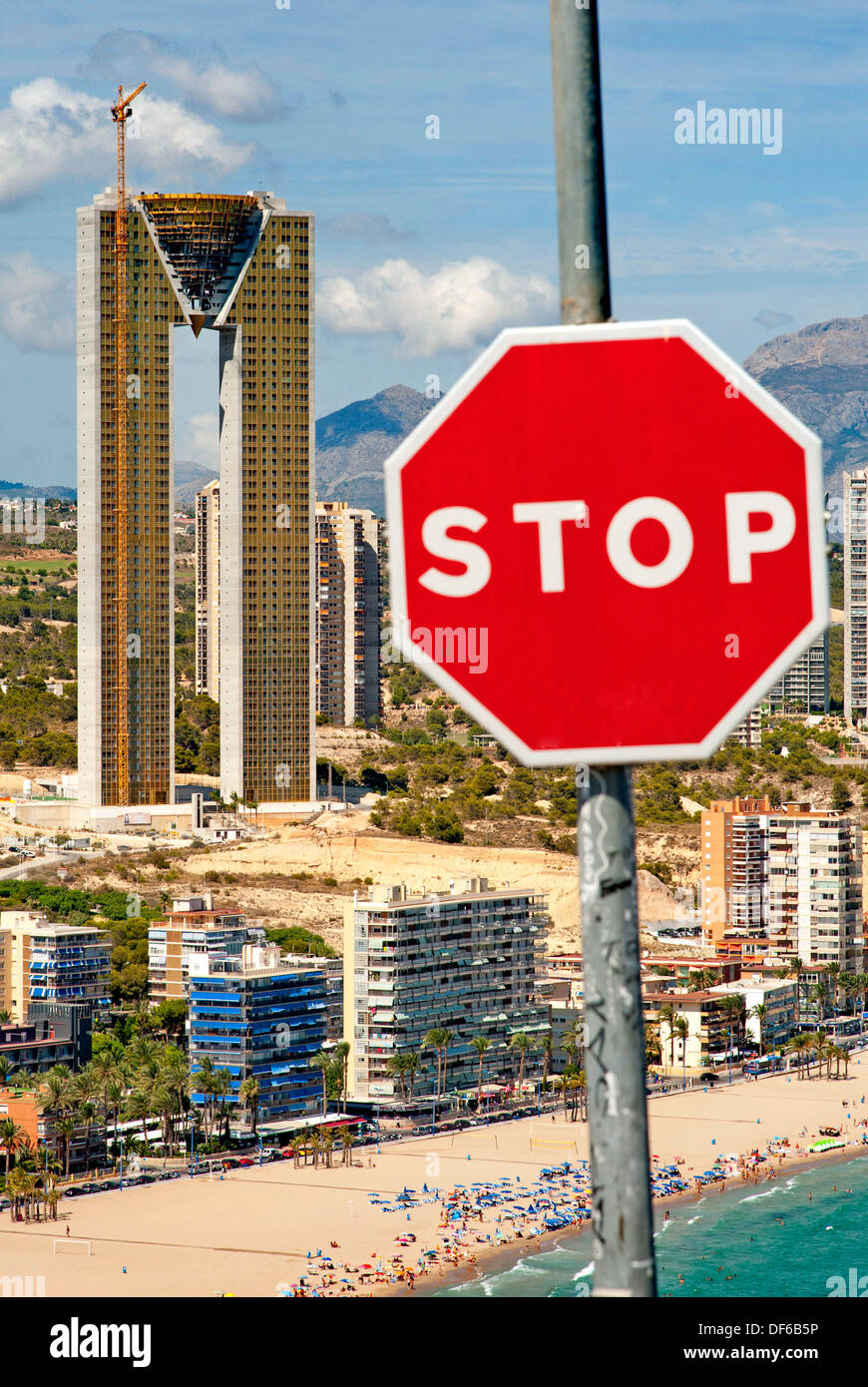 Stop sign in front of InTempo luxury skyscraper and other high-rises in ...