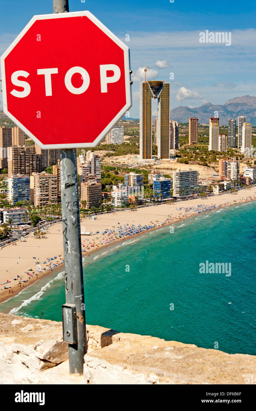 Stop sign in front of InTempo luxury skyscraper and other high-rises in ...