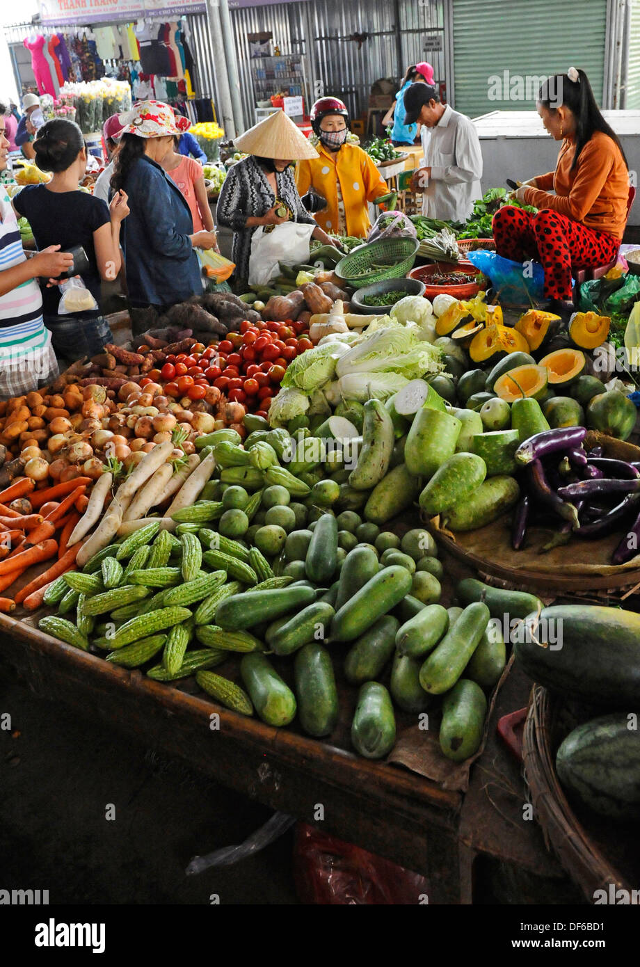 Indoor Vietnamese village market selling fruit, vegetables, fish and ...