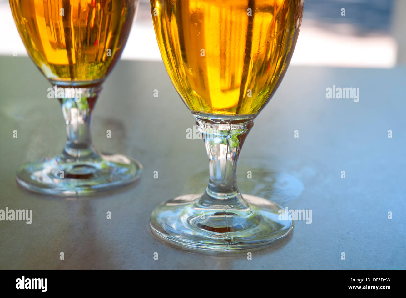 Two glasses of beer. Close view Stock Photo - Alamy