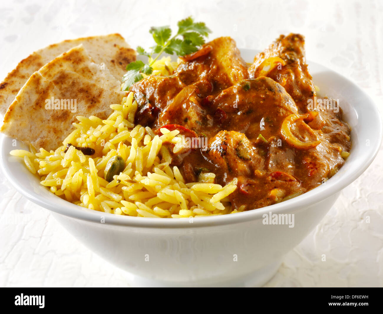 Chicken Madras, pilau rice & popodoms. Indian traditional curry Stock ...