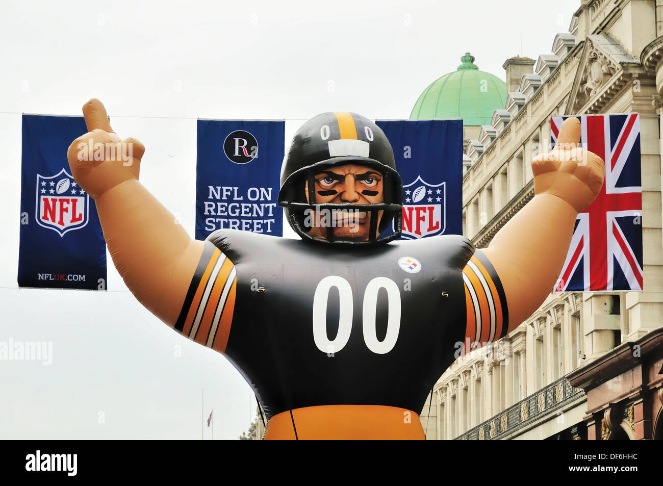 A large blow up American Football player in Pittsburgh Steelers colours ...