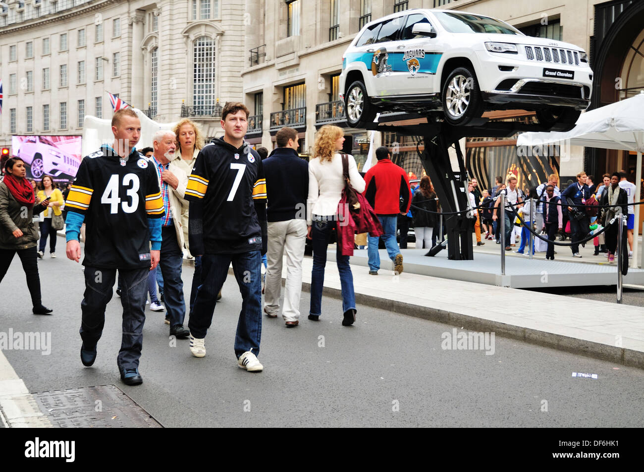 Two Pittsburgh Steelers fans walking along Regent Street during the NFL ...
