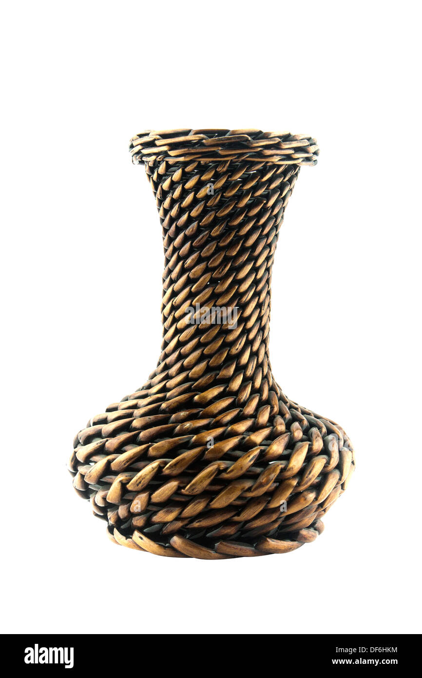 Handwork vase made by a basket weaving method on a white background ...