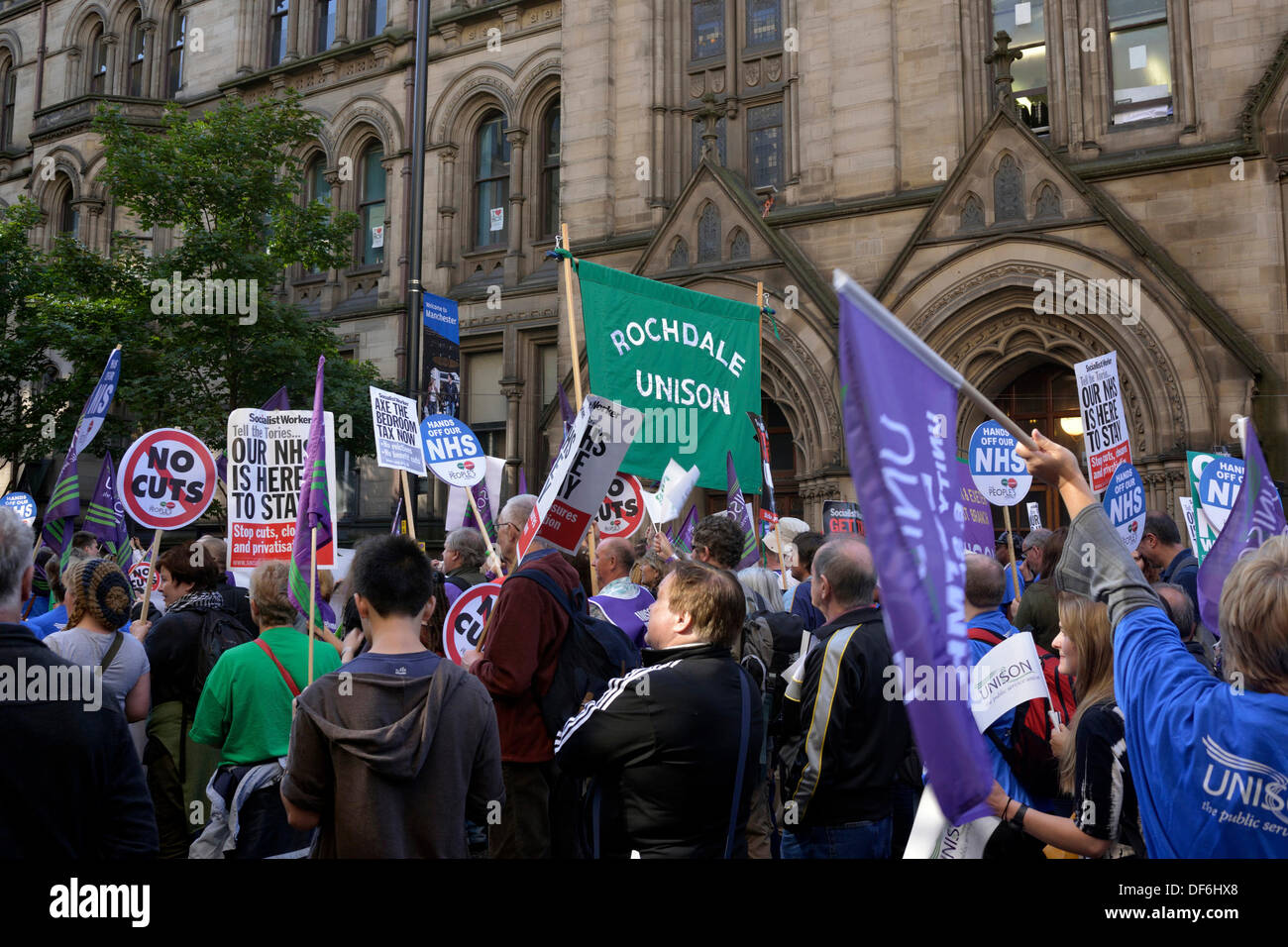 Members of Rochdale UNISON pass Manchester Town Hall as tens of ...