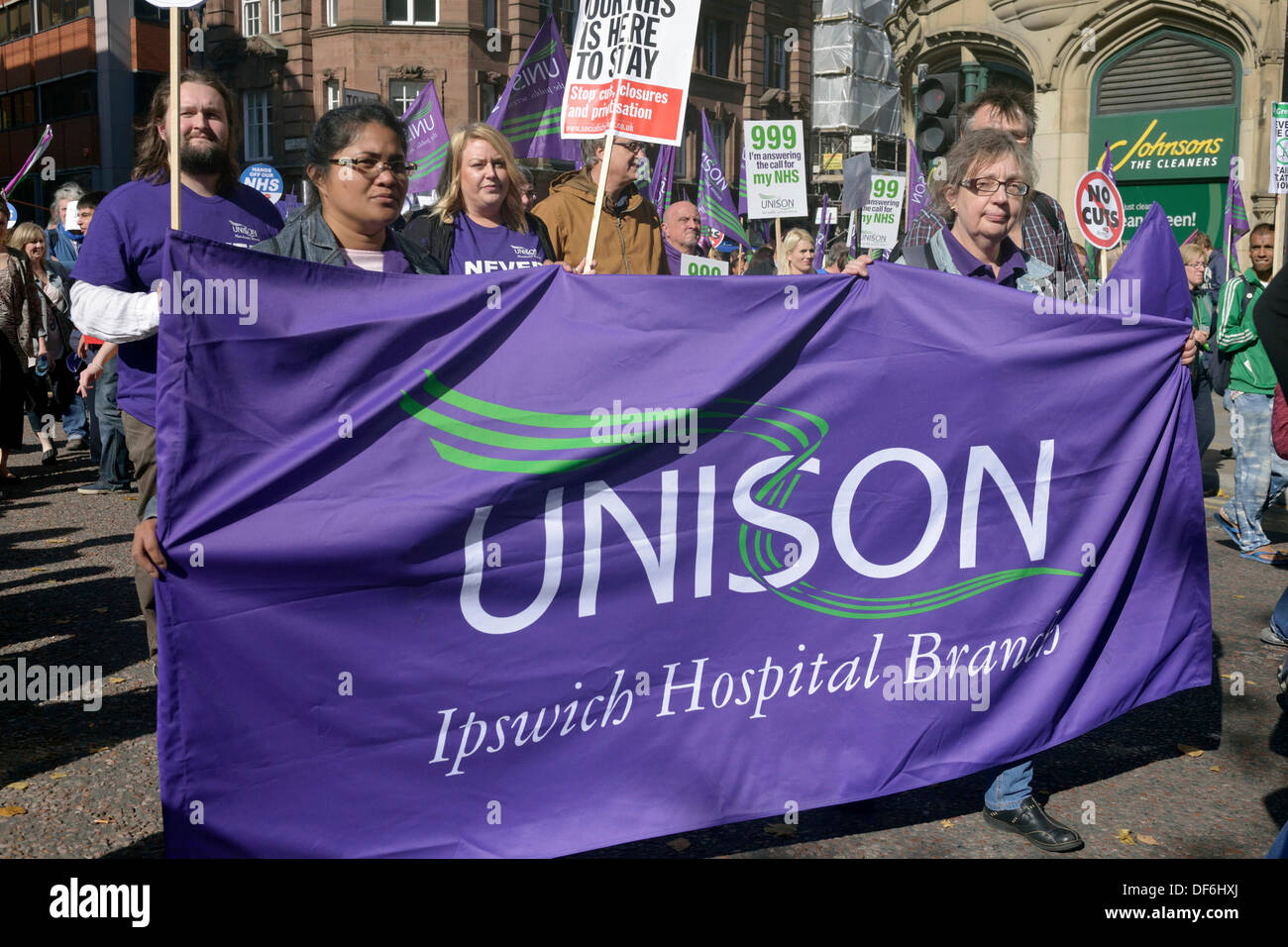 Two women carry a UNISON banner as tens of thousands protest during the ...