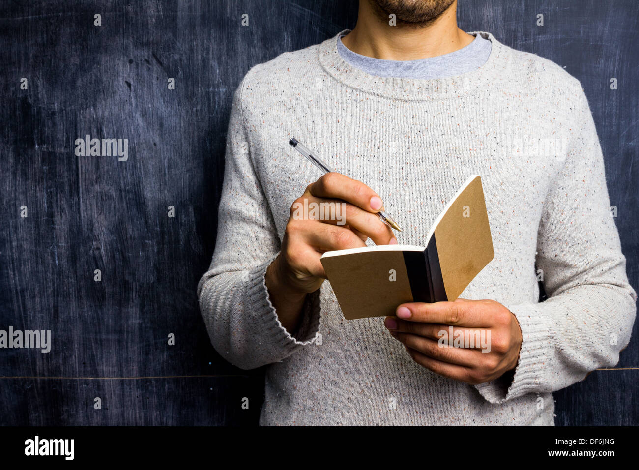 Teacher taking notes classroom hi-res stock photography and images - Alamy