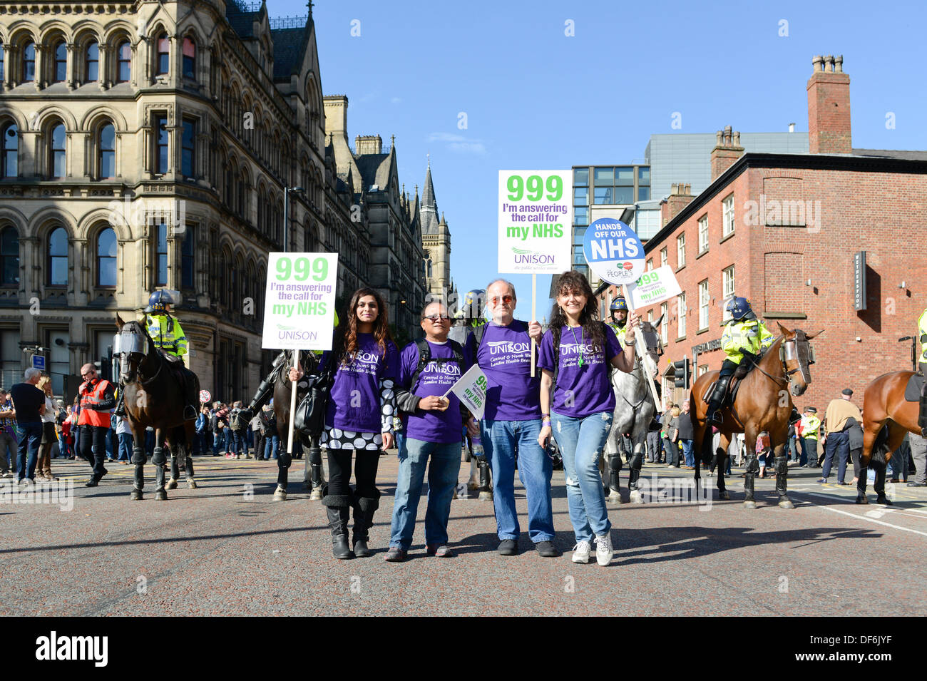 Manchester, UK. 29th Sept 2013. Four Unison members pose for a photo ...