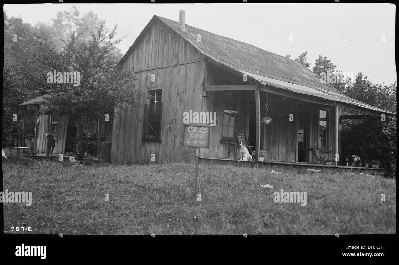 This image depicts the home of Raymond Moss, showing the residential ...