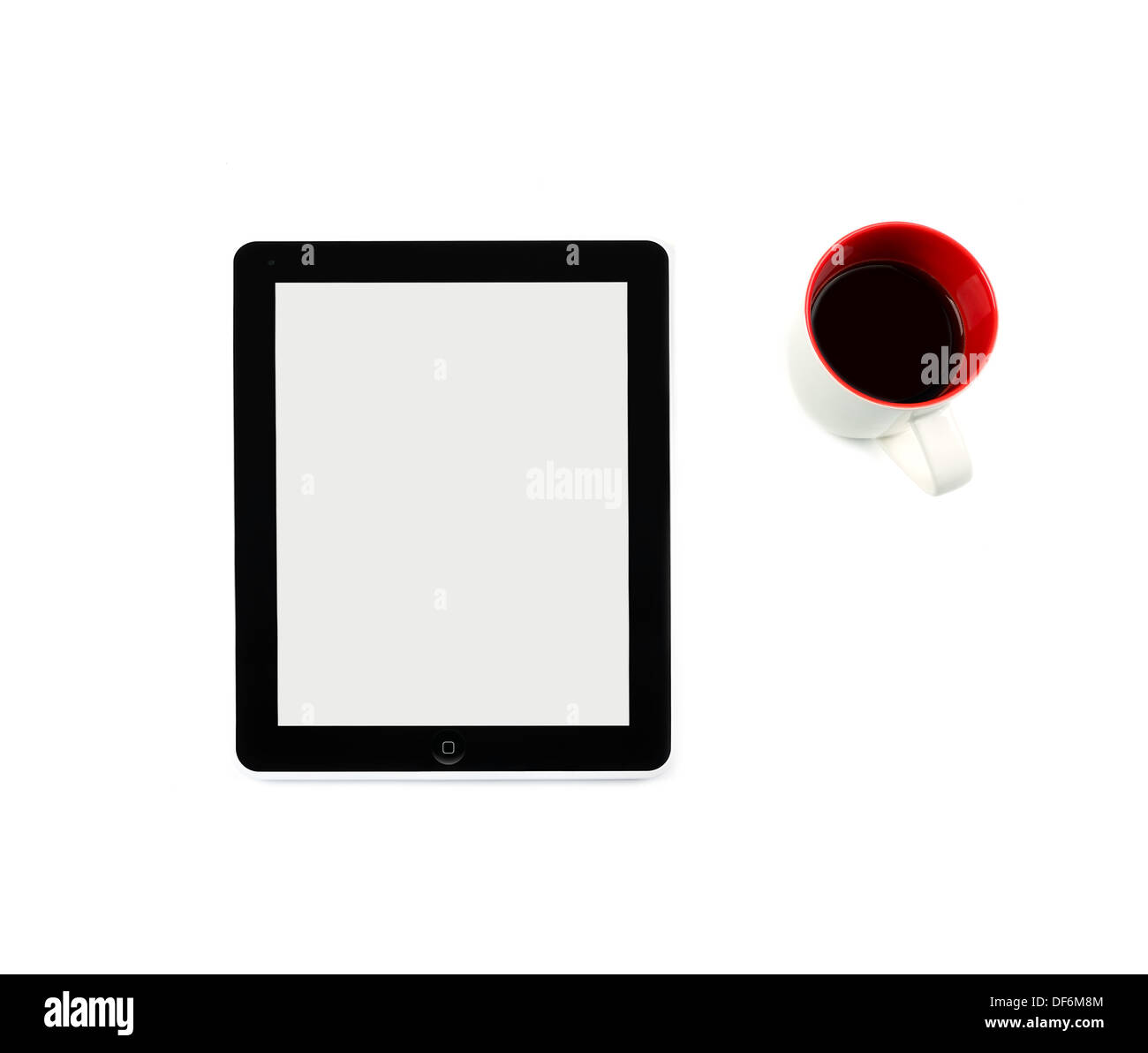 Tablet pc and coffee on white background Stock Photo - Alamy