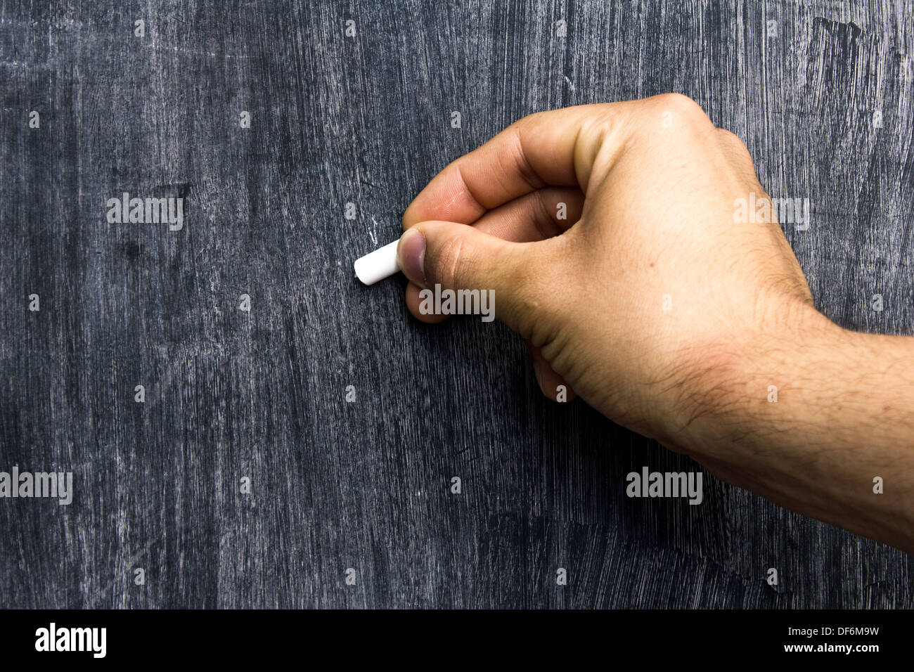 Hand writing with chalk on blackboard Stock Photo - Alamy