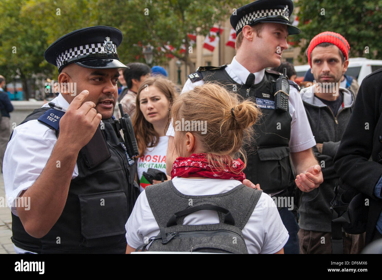 London, UK. 29th Sep, 2013. Police chat with an organiser as dozens of ...