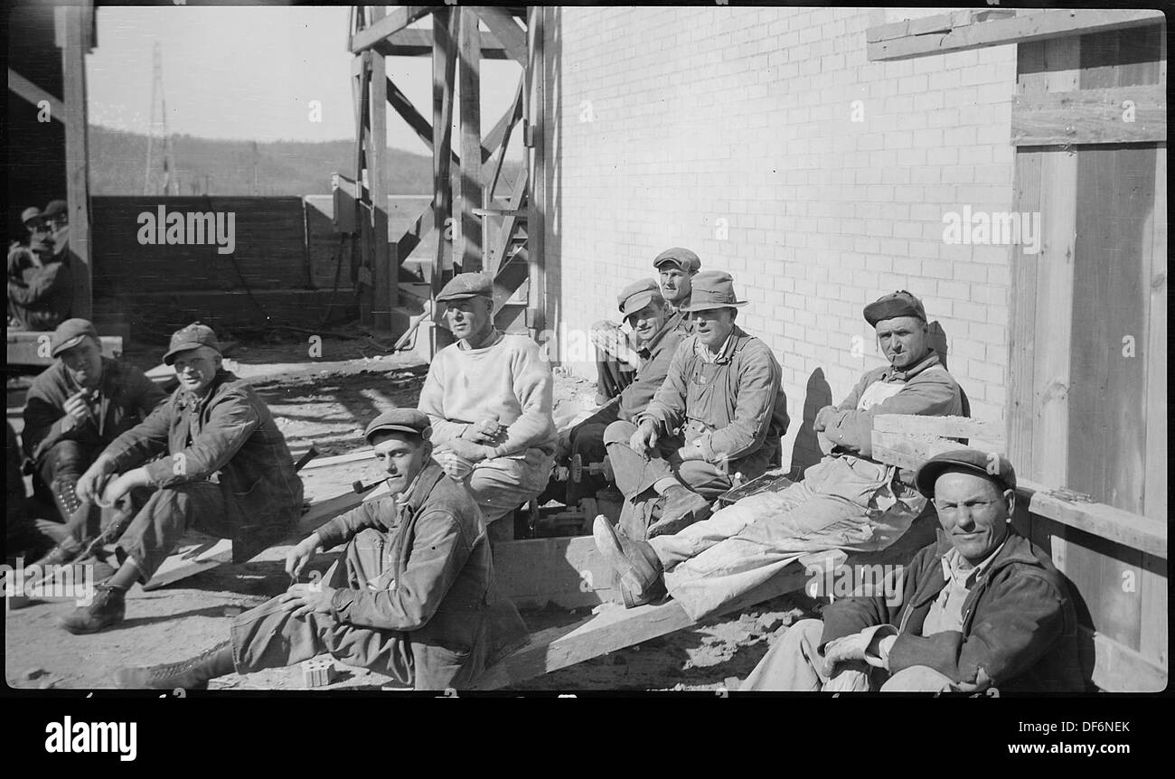 This photograph captures workers during their noon hour recreation time ...