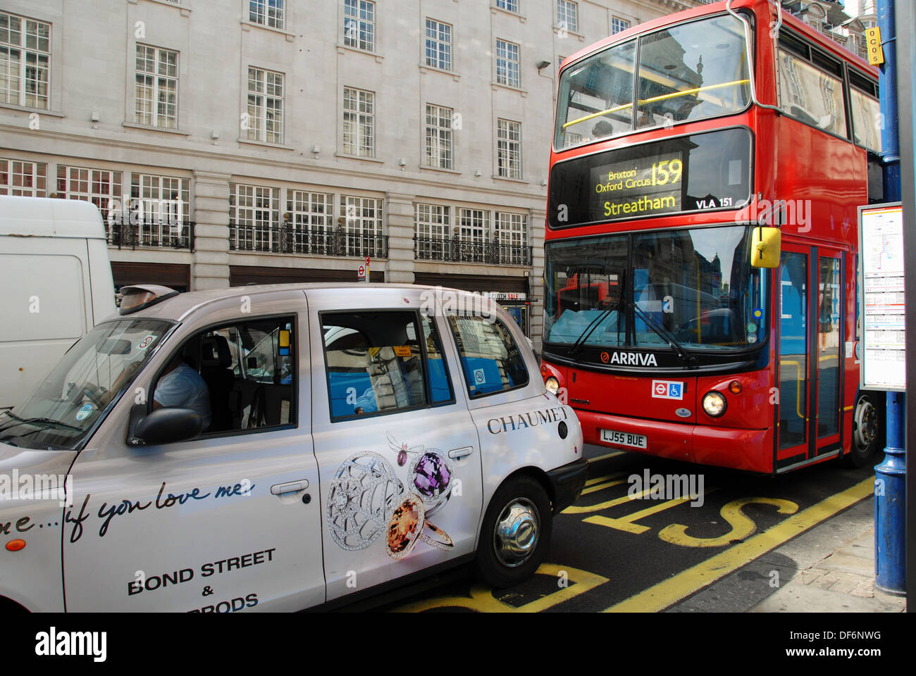Double deck bus and cab at the Piccadilly Circus Bus stop on Regent ...