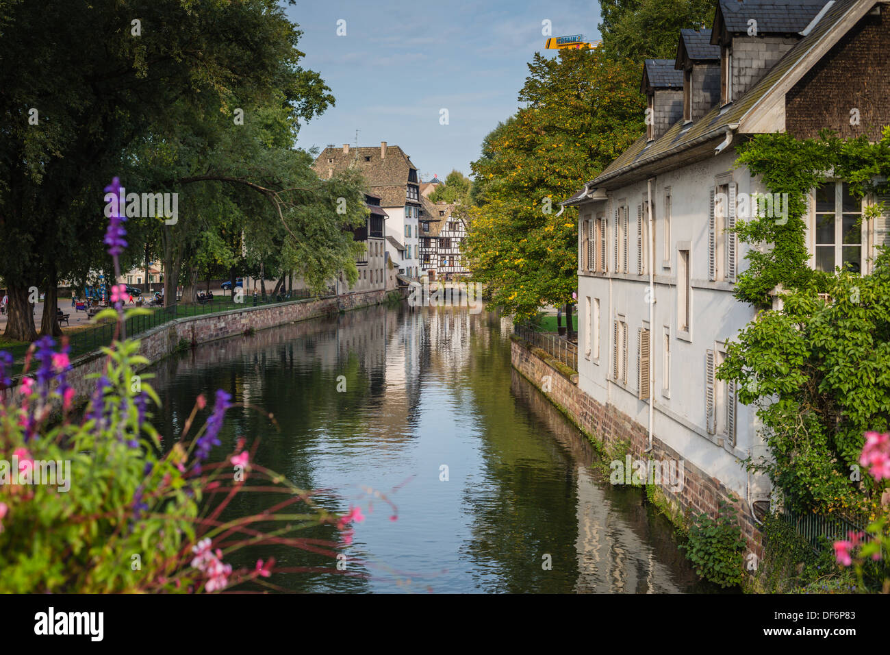 A photograph of a pretty and peaceful canal in Strasbourg, France. It ...