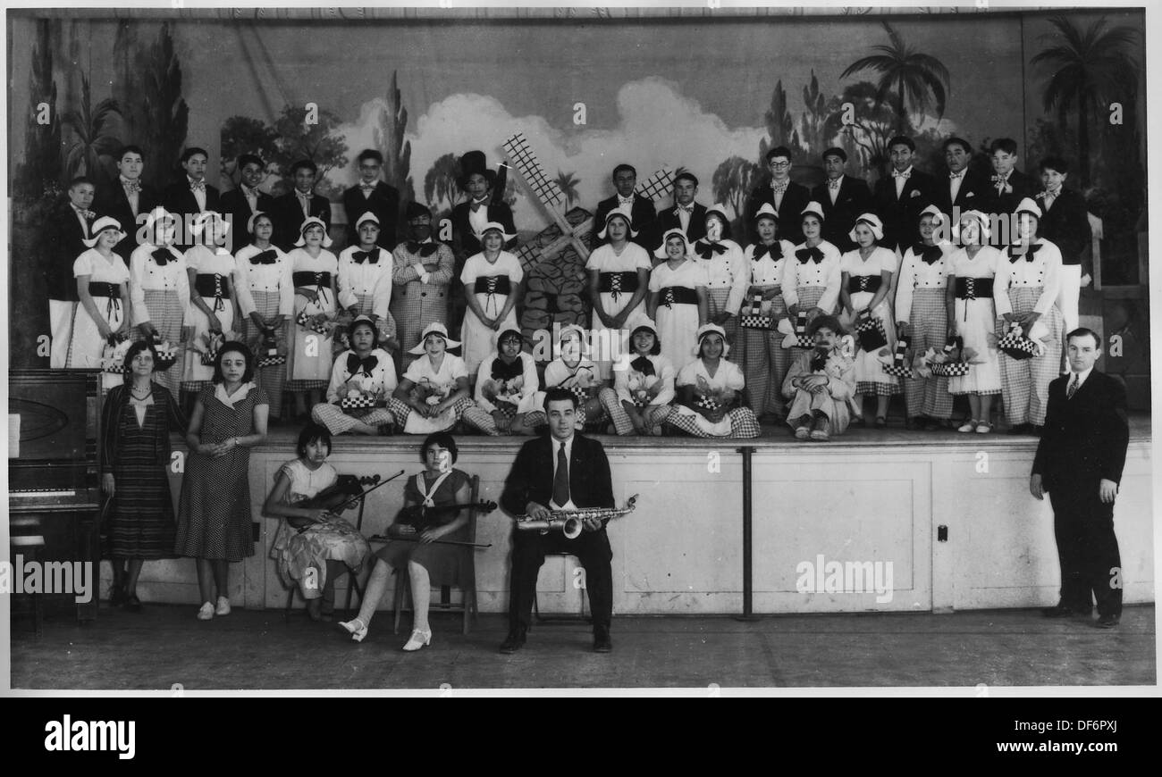 The cast and musicians of an operetta are pictured, highlighting the ...