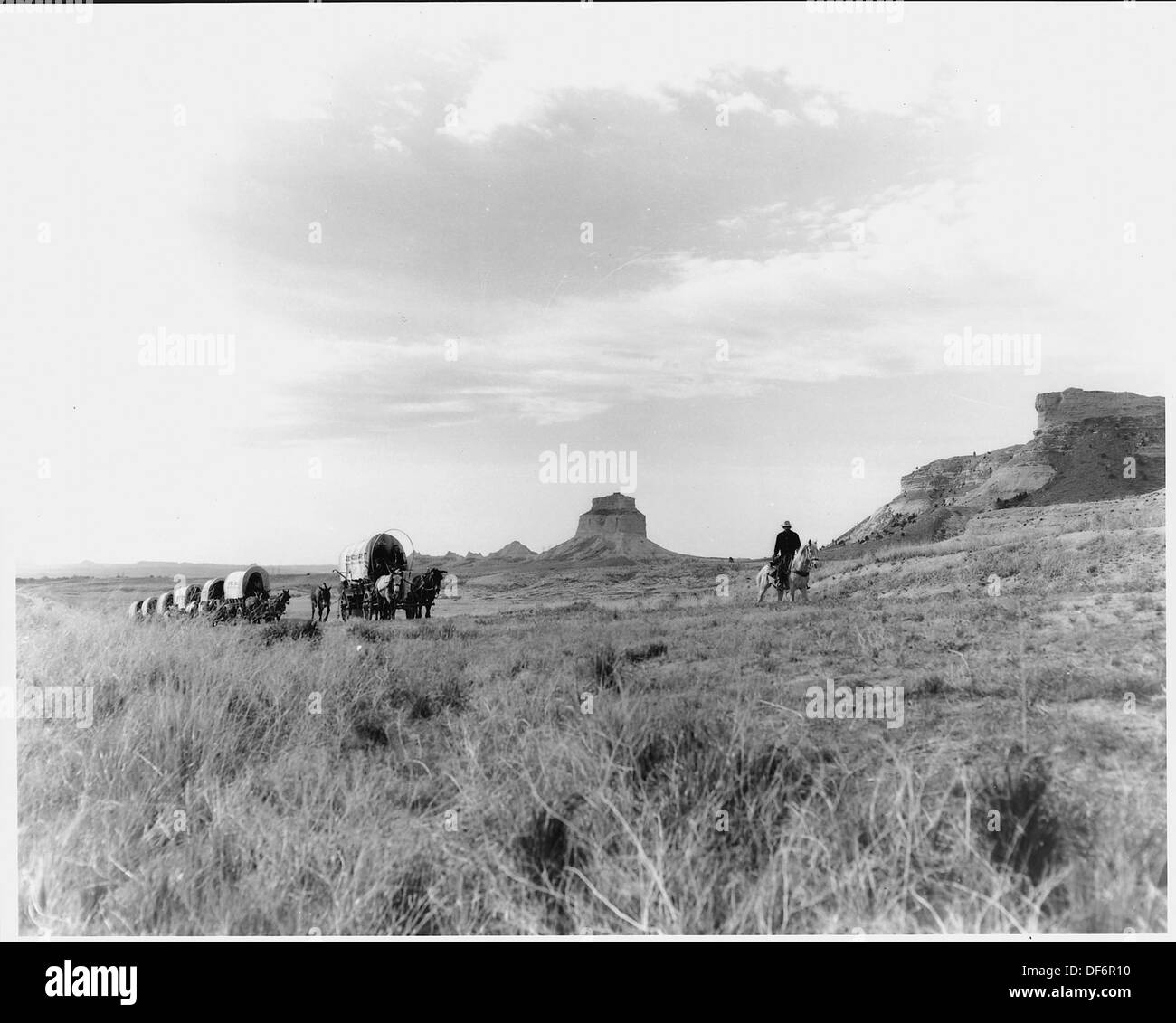 This image captures a reenactment of the Oregon Trail, showcasing ...