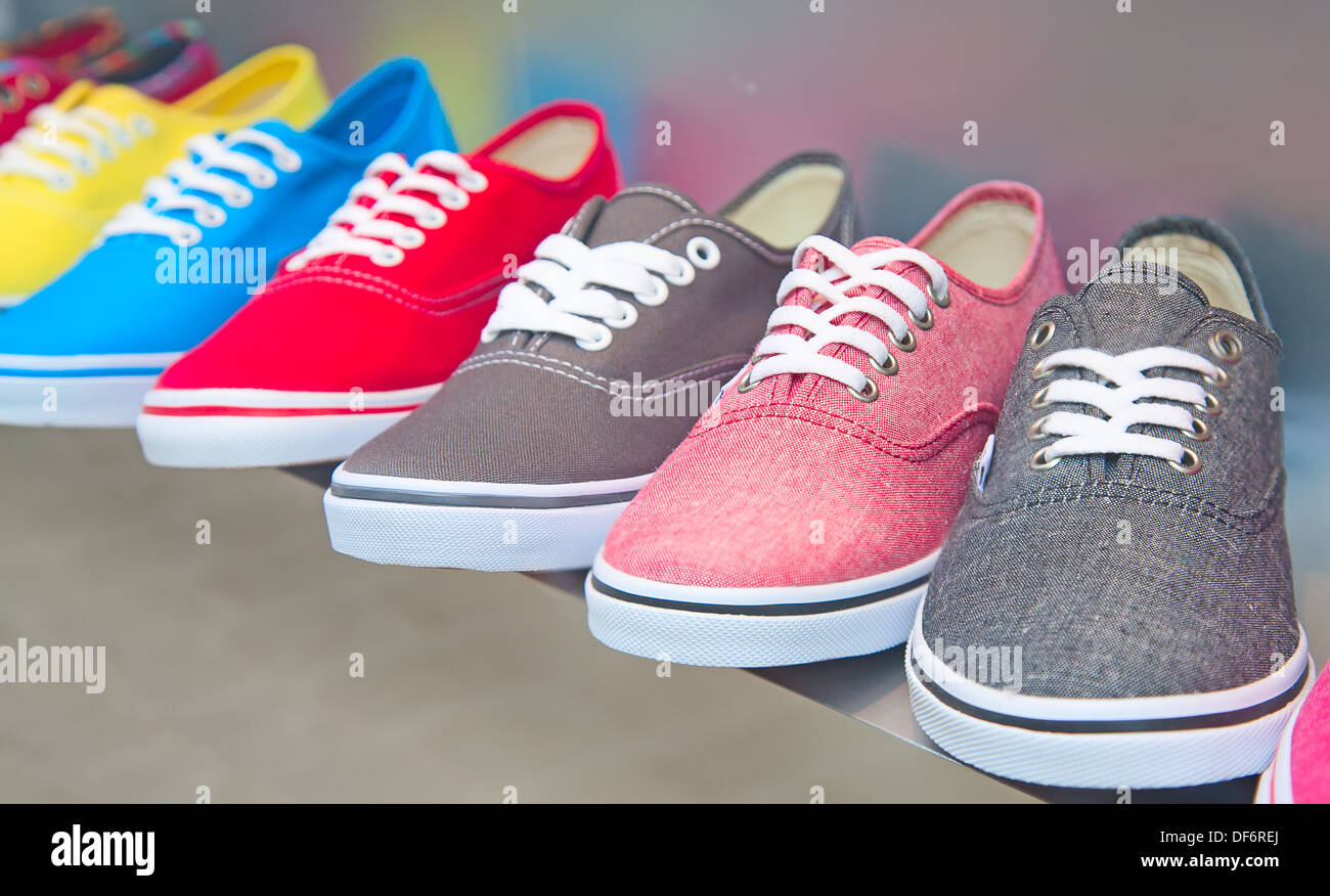 variety of the colorful shoes in the shop Stock Photo - Alamy