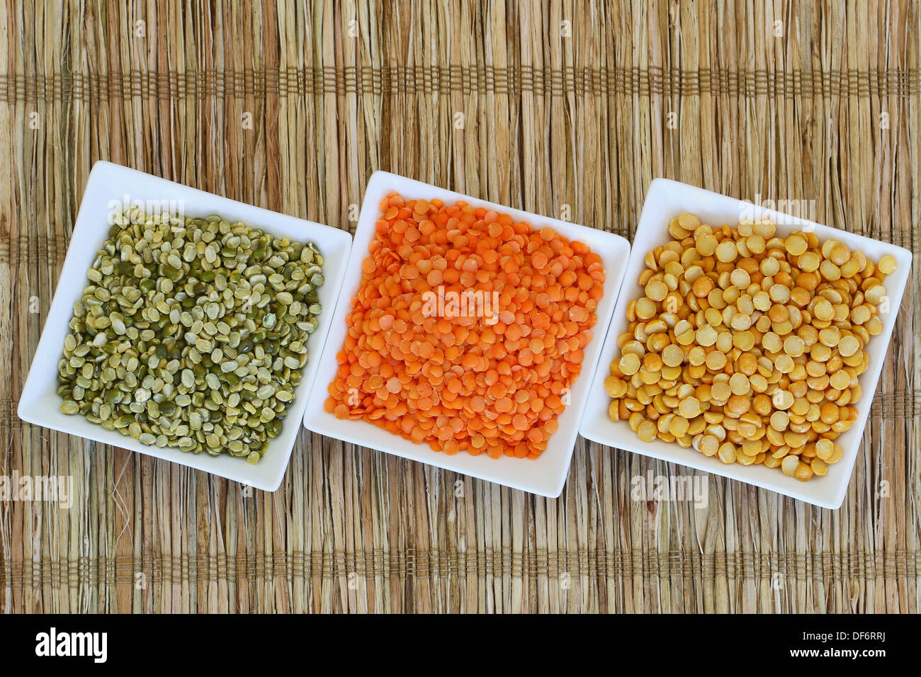 Selection of pulses in white bowls with copy space Stock Photo - Alamy