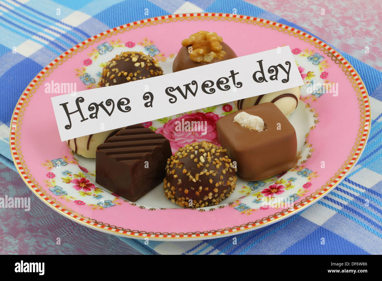 Have a sweet day card with selection of chocolates Stock Photo - Alamy
