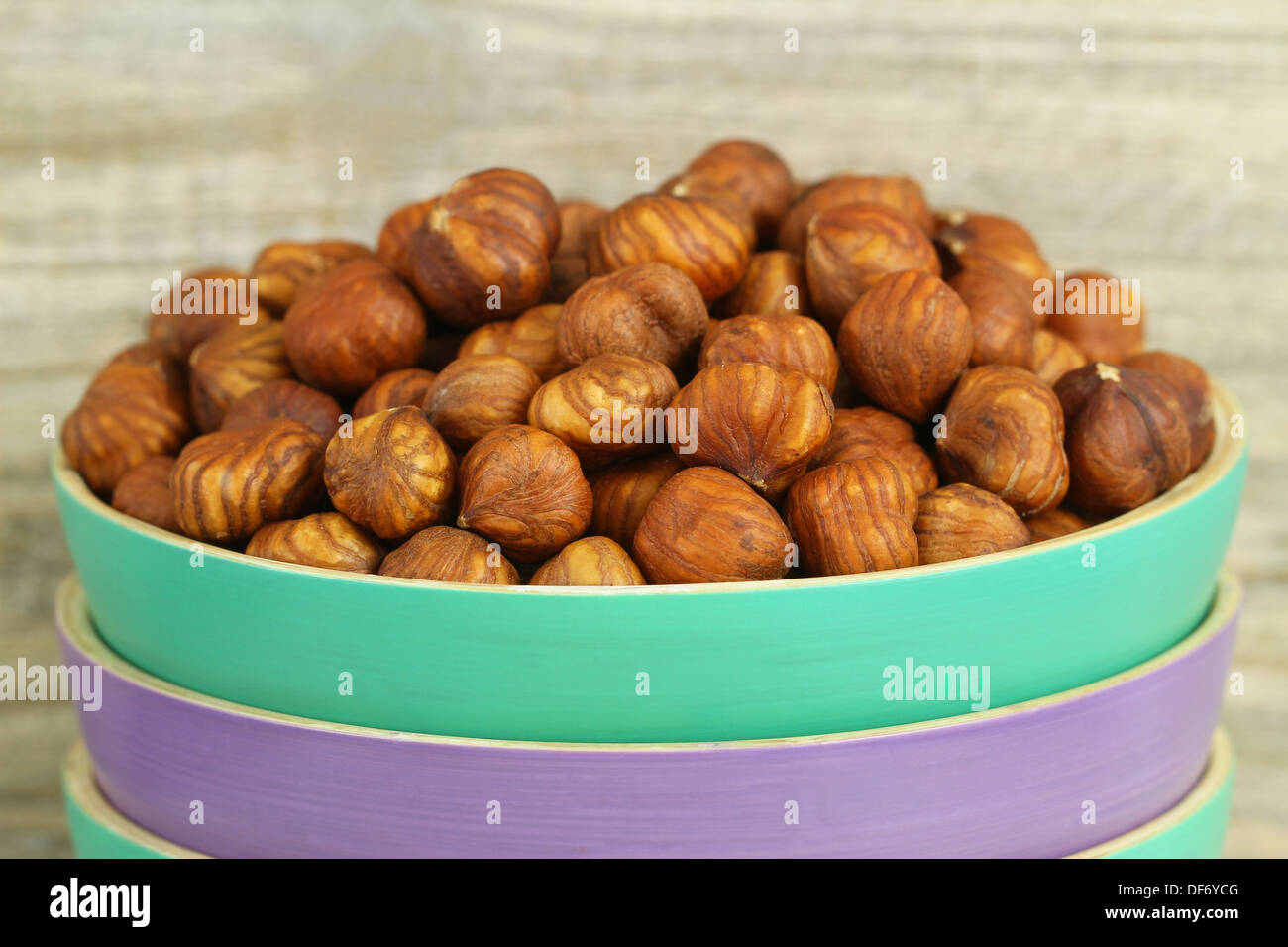 Hazelnuts in wood bowl hi-res stock photography and images - Alamy