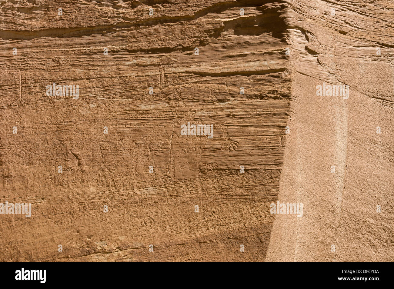 Petroglyph or rock art carvings of Native Americans on a canyon wall in ...