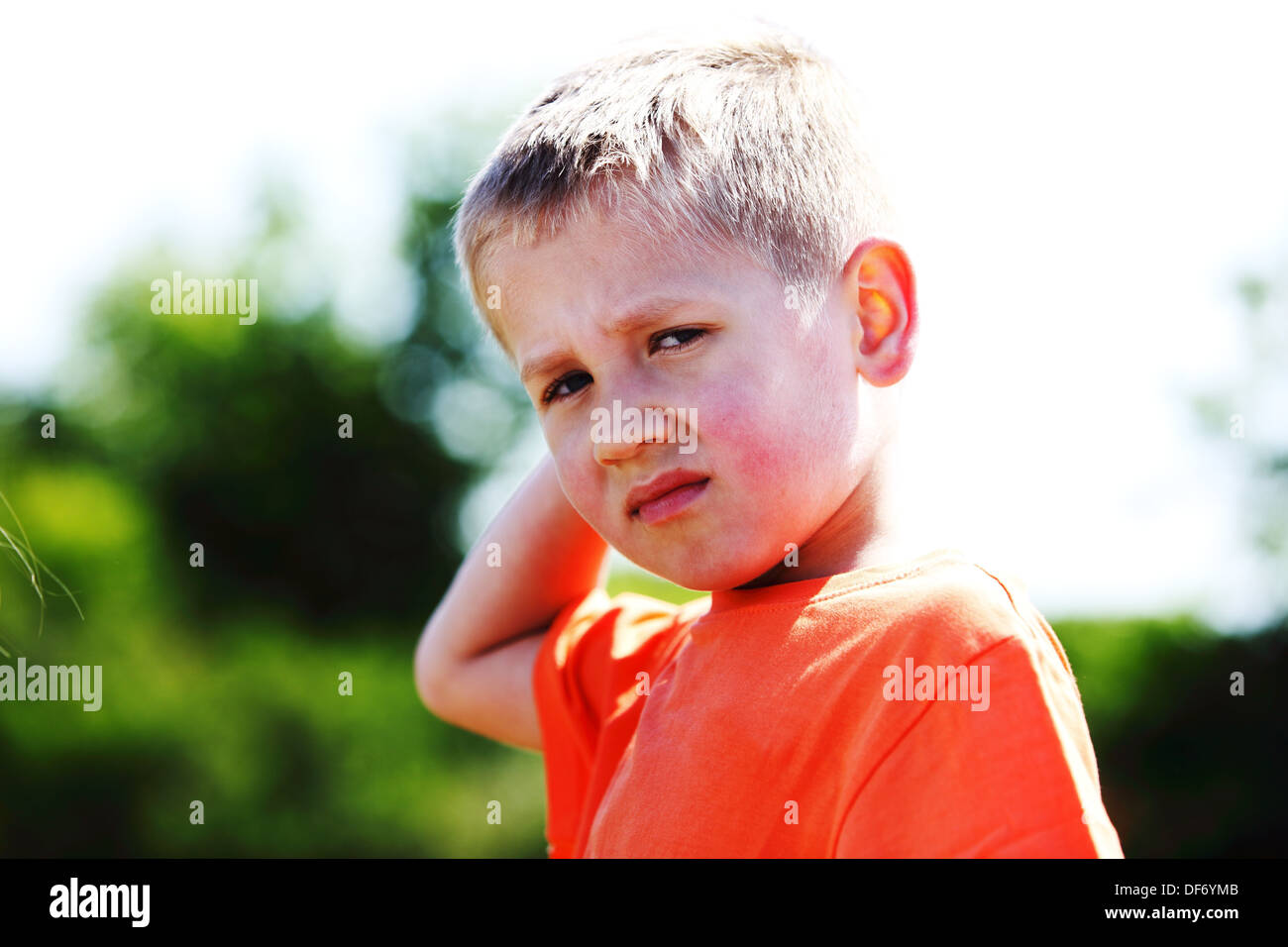 unhappy child expression. Sad little boy outdoor Stock Photo - Alamy